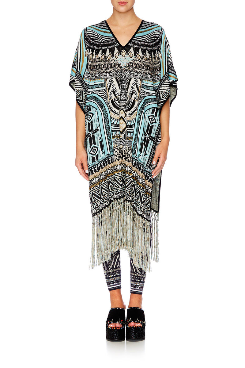LONG V NECK PONCHO WITH FRINGING RUNAWAY READY – CAMILLA