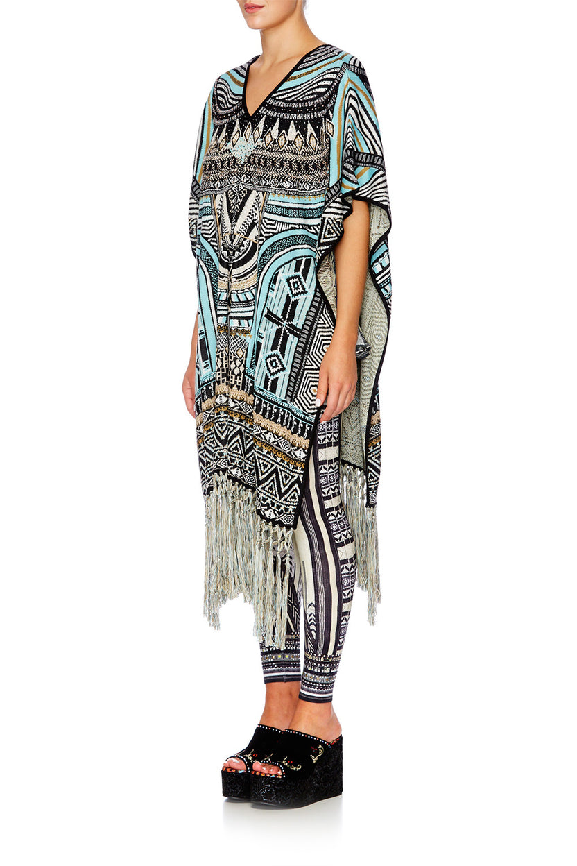 LONG V NECK PONCHO WITH FRINGING RUNAWAY READY – CAMILLA